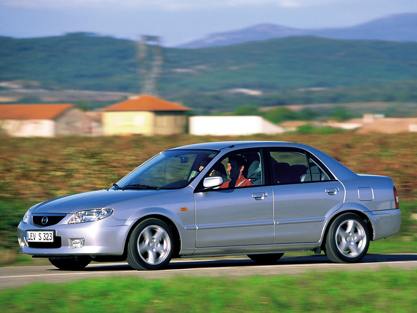 Тюнинг Mazda Familia sedan 2001, фото тюнинга Мазда Фамилия